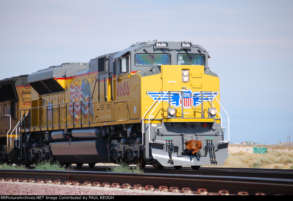 UP 8686 as she pulls west out of the BNSF Barstow yard complex towards Long Beach, Ca.